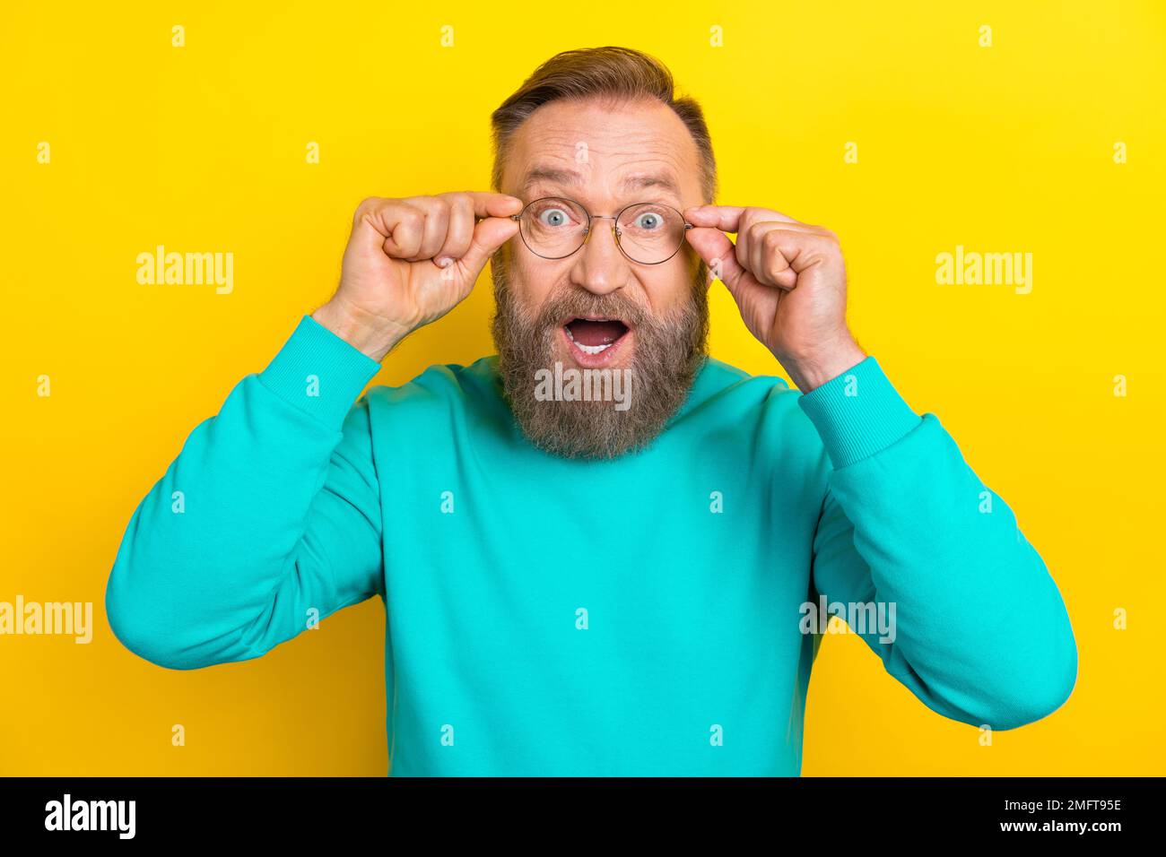 Photo portrait of nice retired man touch eyewear astonished reaction ...