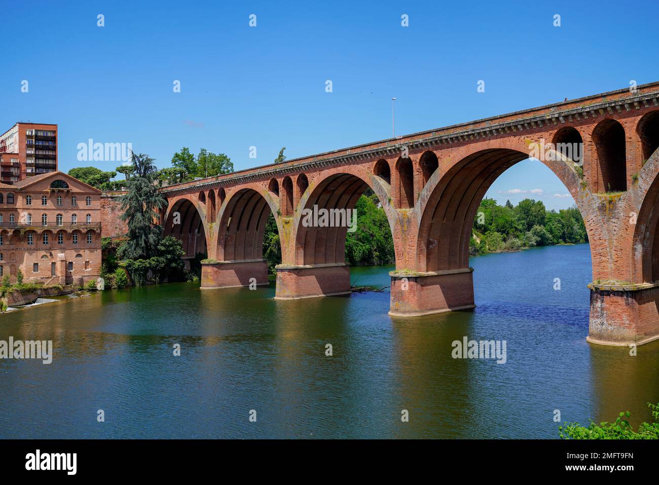 Albi old red brick stone bridge over Tarn river in France Stock Photo ...