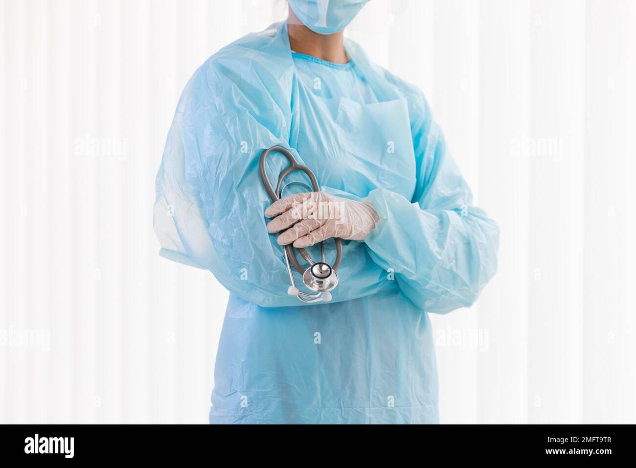 front view female doctor wearing protective clothing. High resolution ...