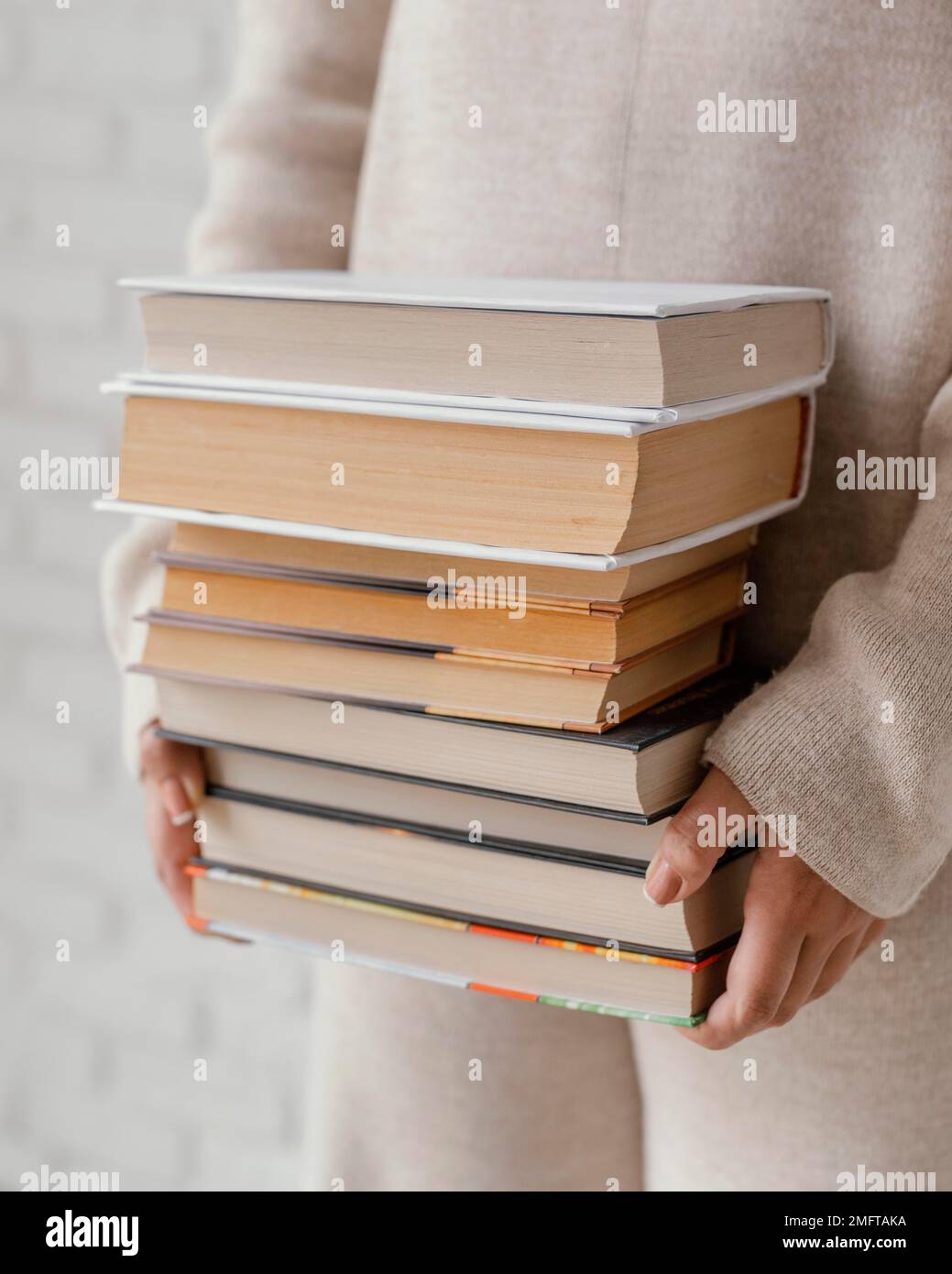 High stack of books hi-res stock photography and images - Alamy
