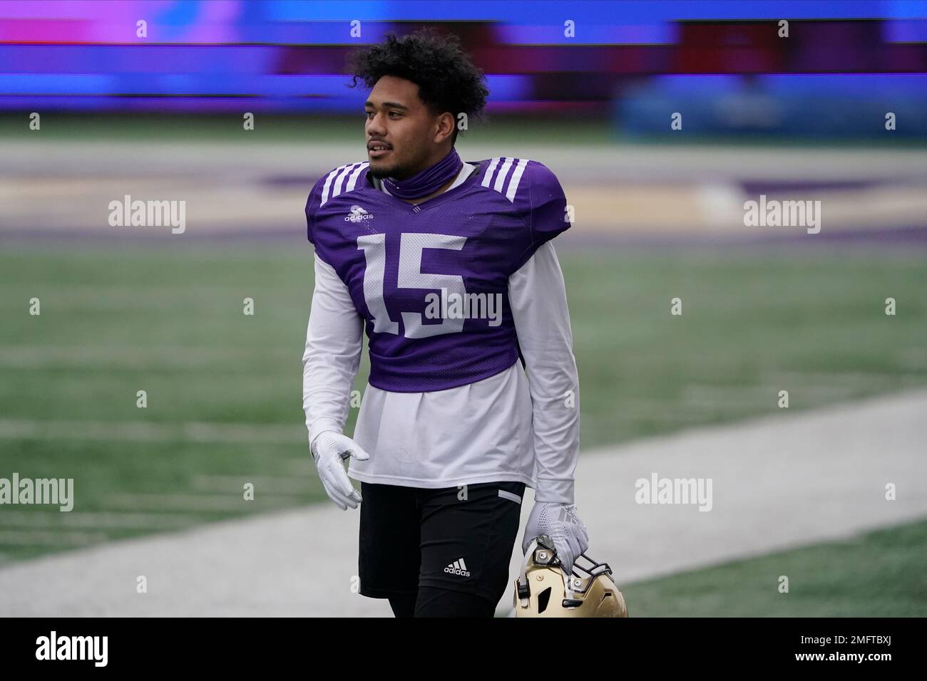 Washington linebacker Daniel Heimuli takes part in NCAA college ...