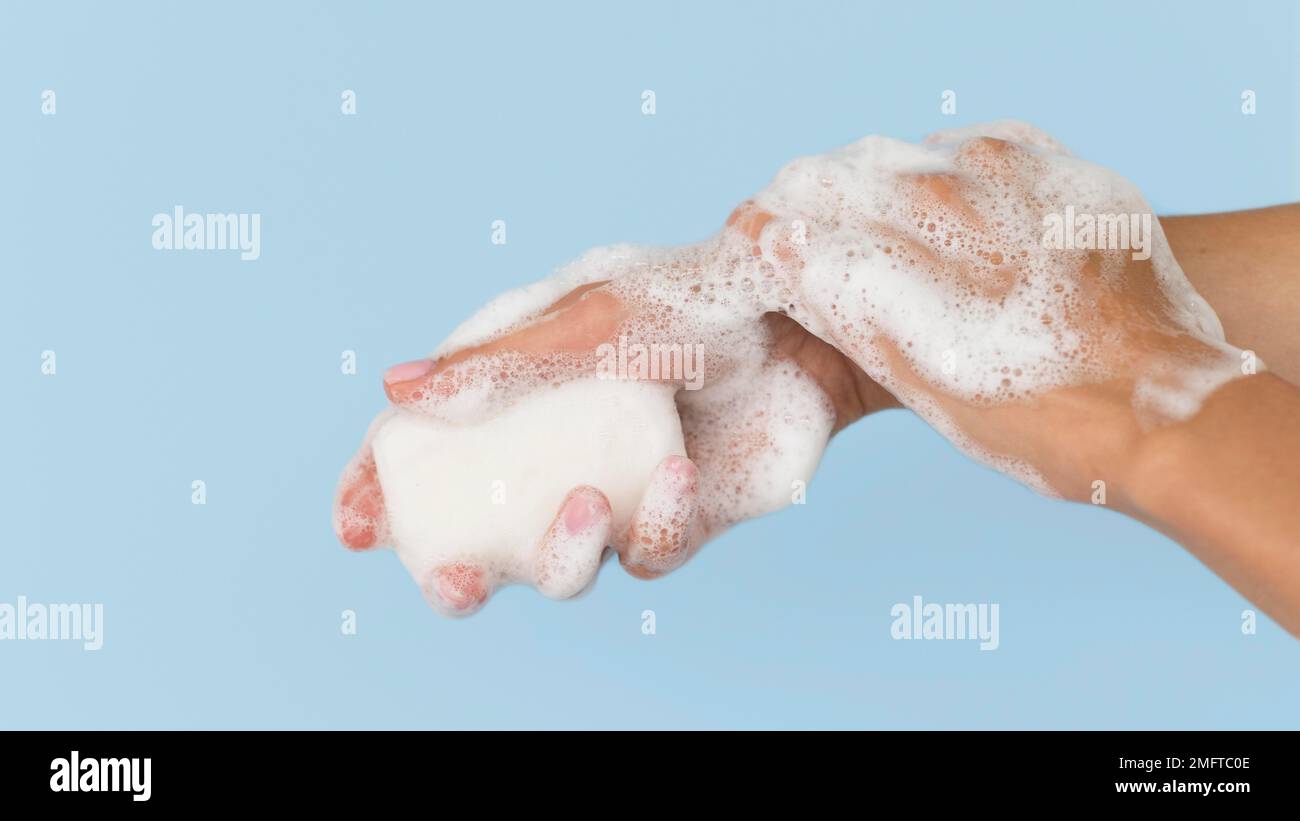person washing hands with soap Stock Photo - Alamy