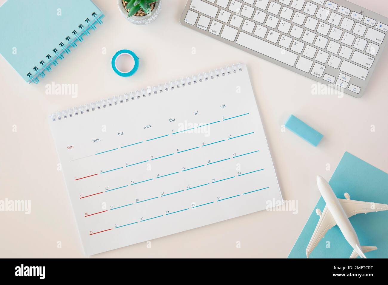 flat lay planner calendar with blue accessories Stock Photo - Alamy