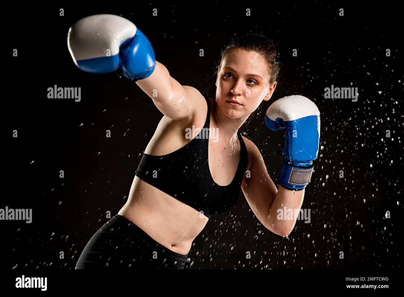 front view female boxer posing Stock Photo - Alamy