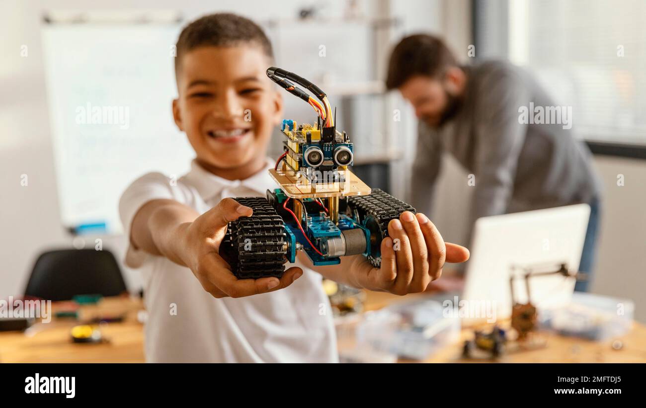 father son making robot Stock Photo - Alamy