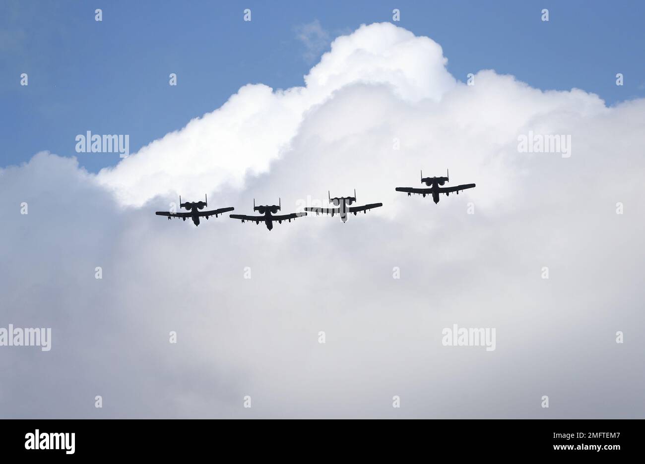 A military flyover takes place before an NFL football game between the ...
