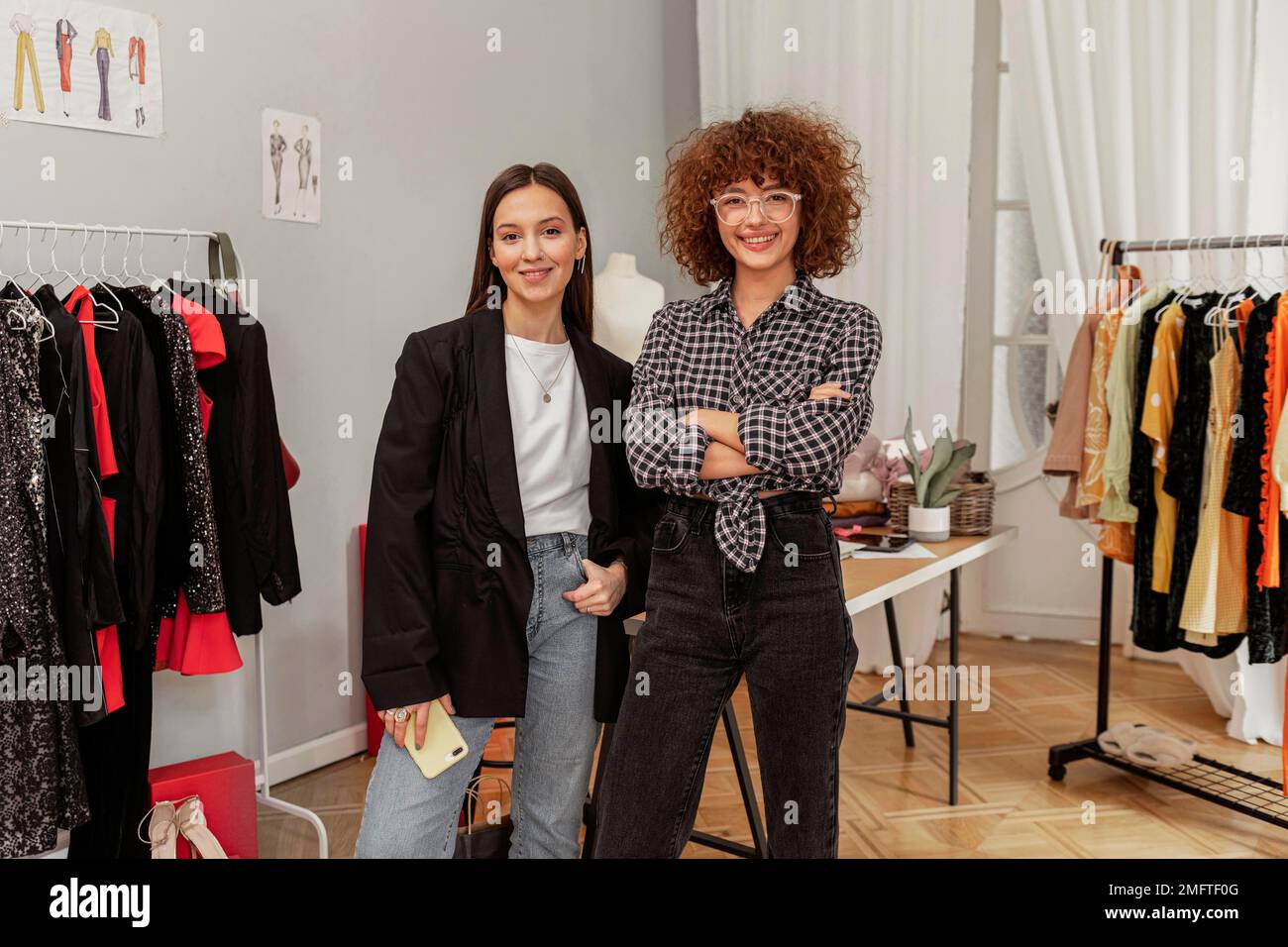clothes store employees working Stock Photo - Alamy