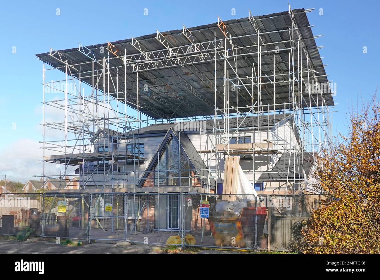 Building construction bungalow conversion to house vertical plastic ...