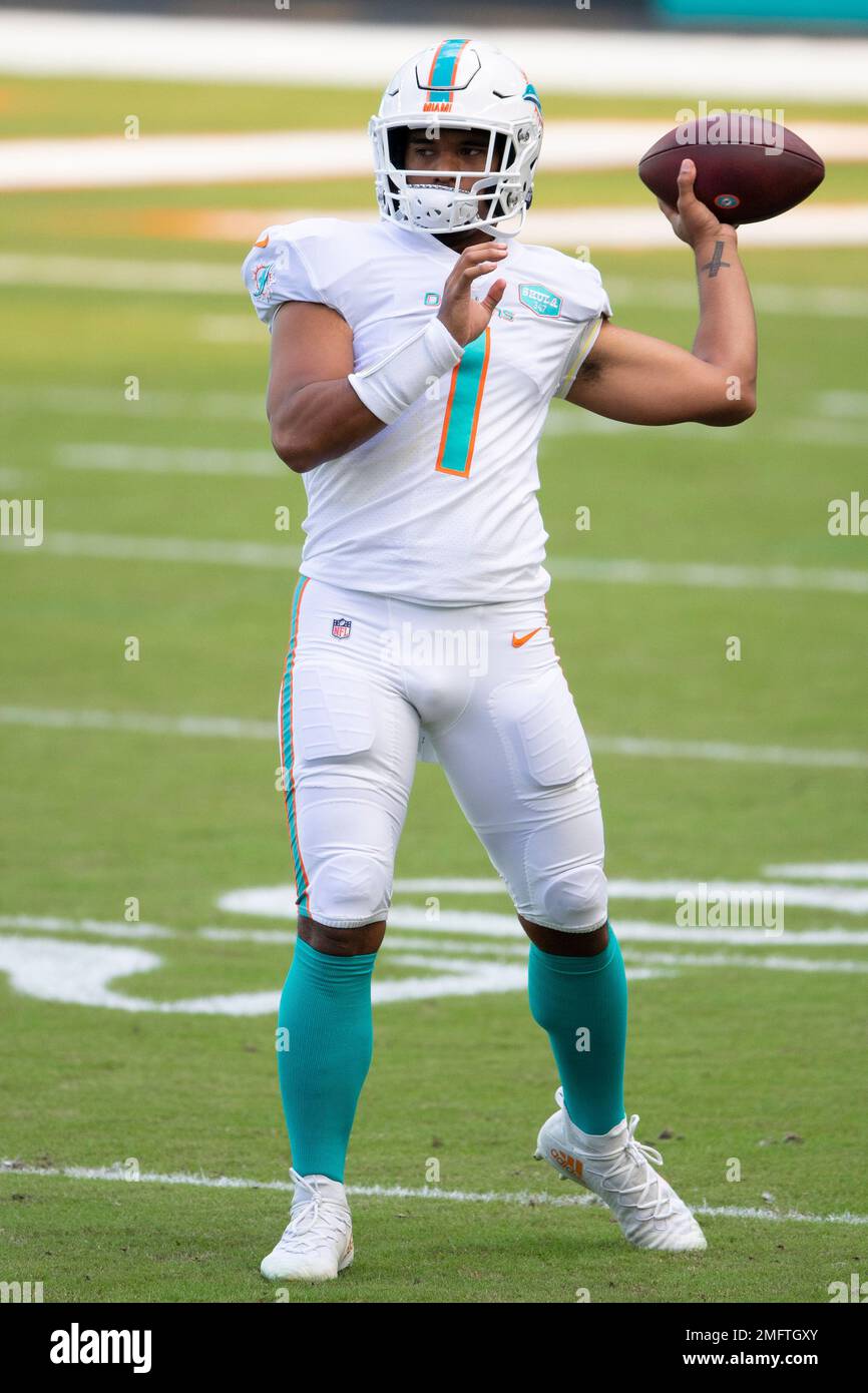 Miami Dolphins quarterback Tua Tagovailoa (1) throws the ball on the ...