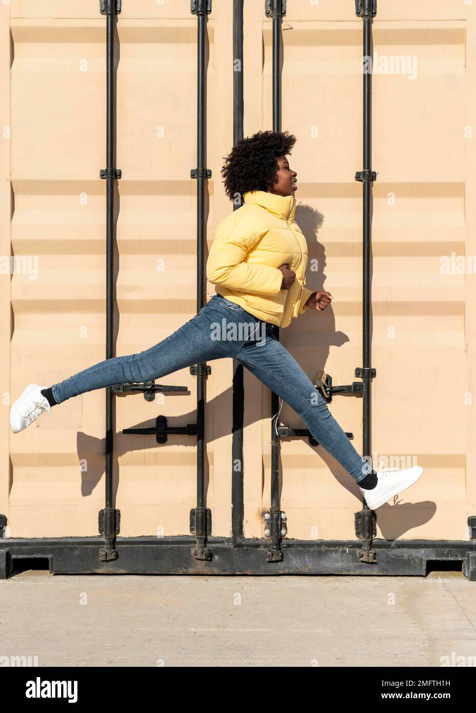 portrait young woman jumping 9 Stock Photo - Alamy