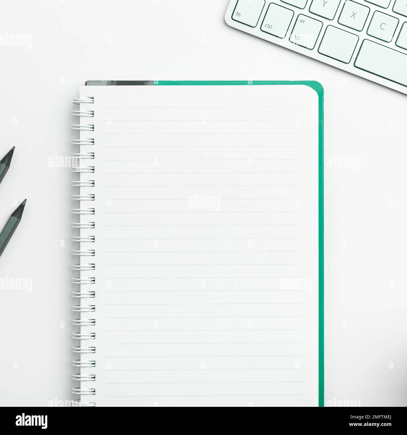 Paper with important text near keyboard. Information written on ...