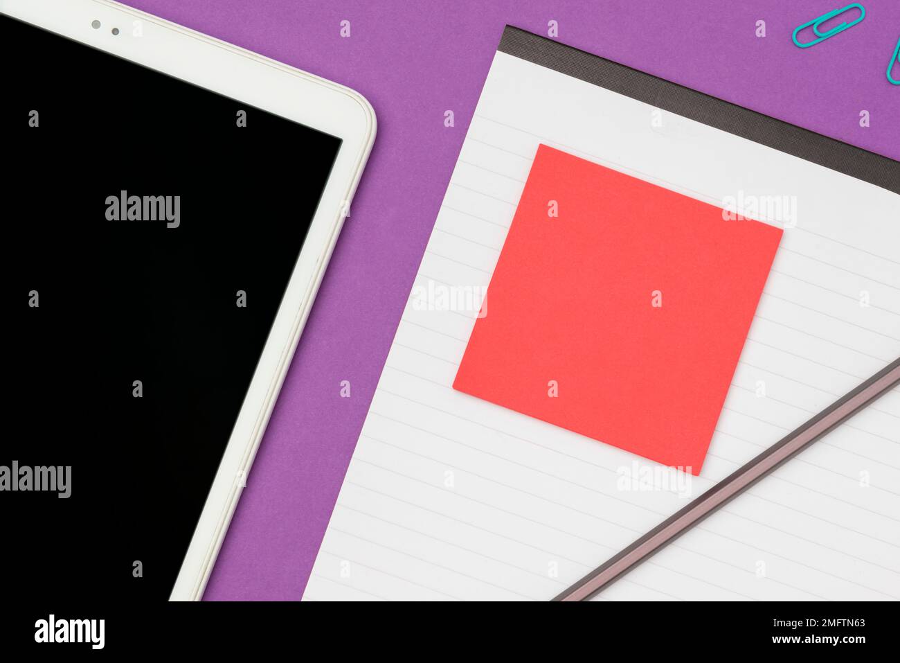 Mobile Phone Lying on Desk. Important infrormation written on colored ...