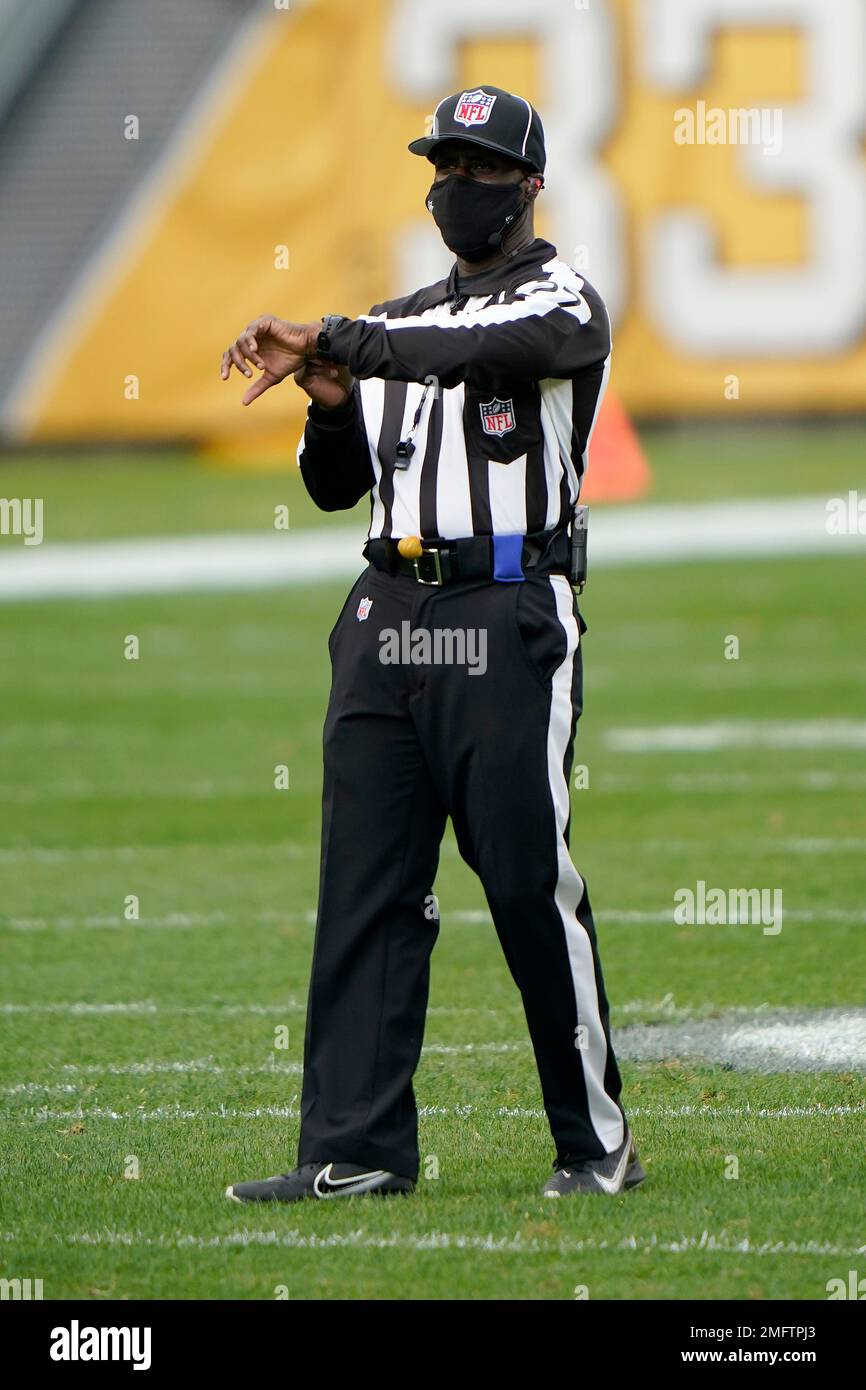 back judge Lee Dyer (27) looks on during an NFL football game between ...