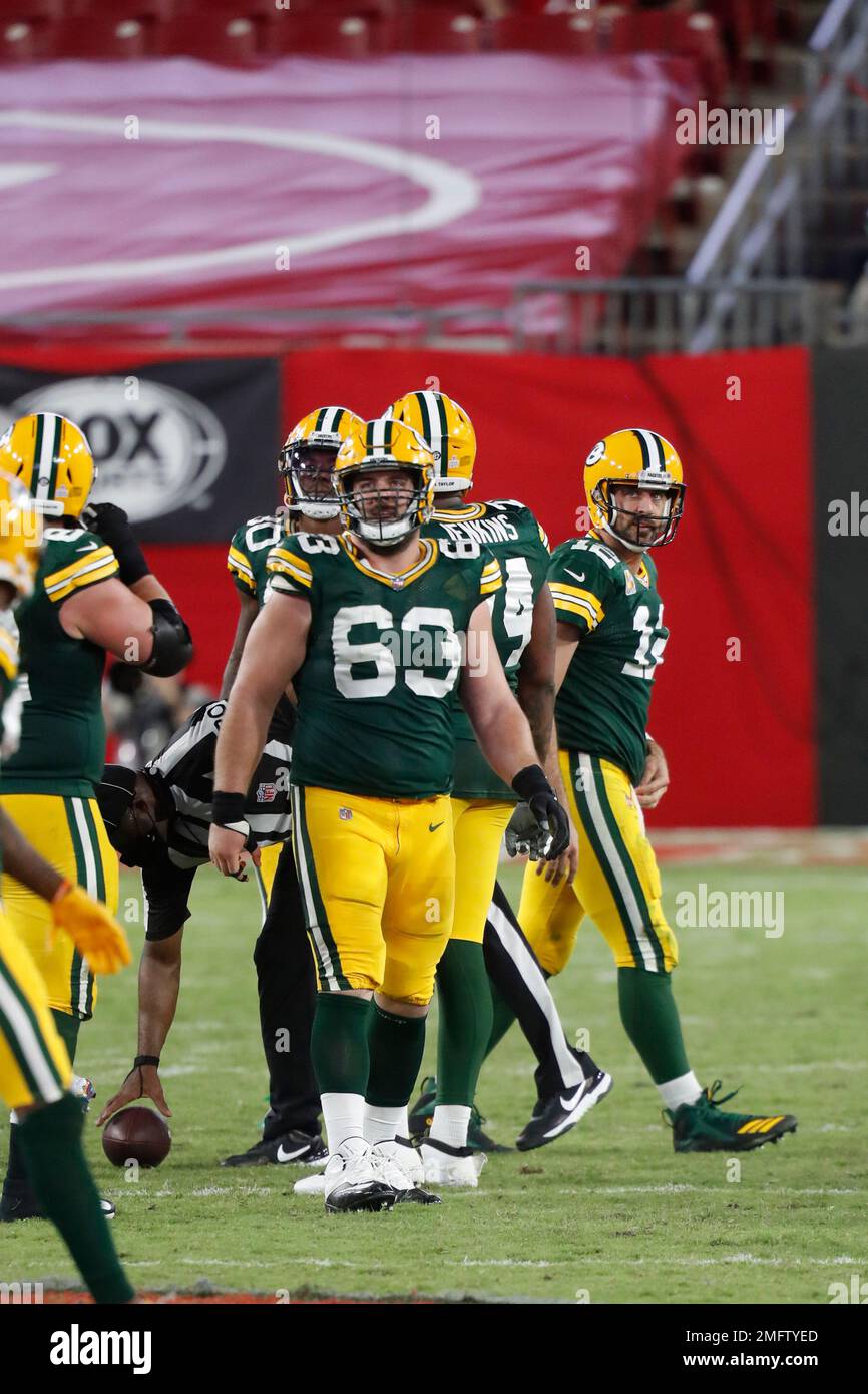 Green Bay Packers center Corey Linsley (63) looks at the scoreboard in ...