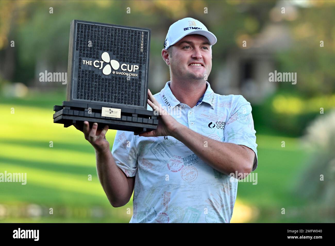Jason Kokrak holds the championship trophy after winning the CJ Cup ...