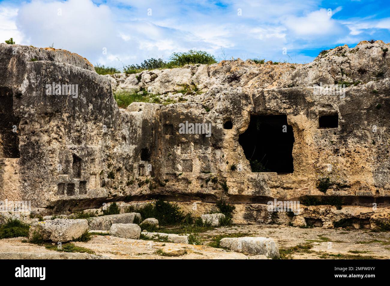 Terrace with images of important deceased carved into the rock ...