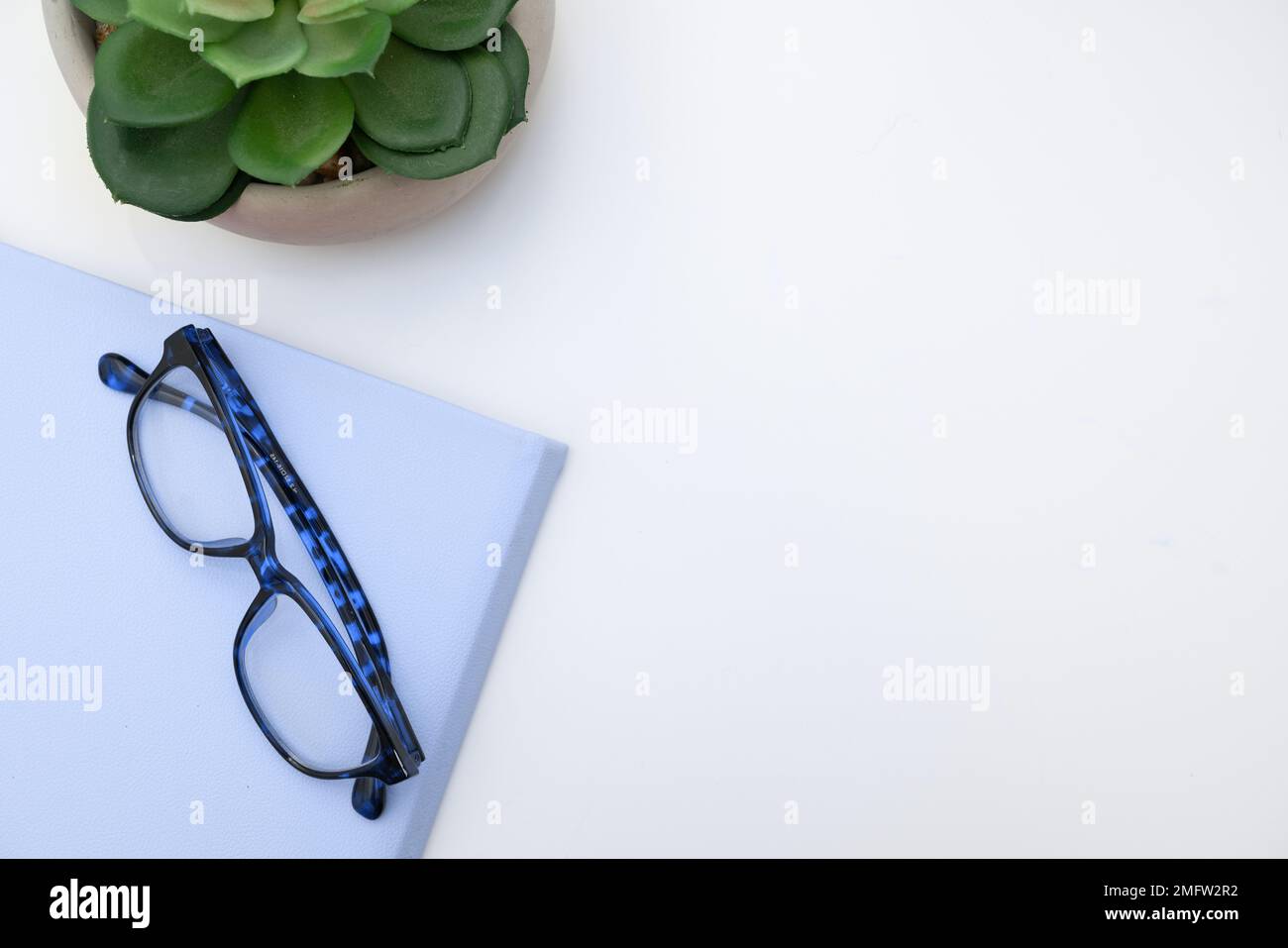 Office Supplies Over Desk With Keyboard And Glasses And Coffee Cup For ...