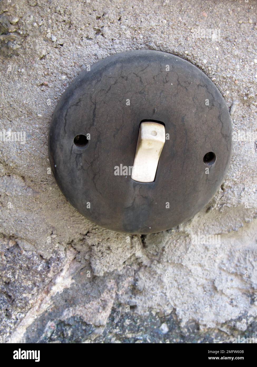 Old light switch Stock Photo - Alamy