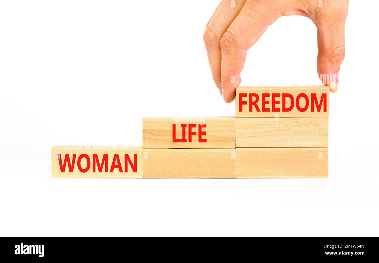 Woman life freedom symbol. Concept words Woman Life Freedom on wooden ...