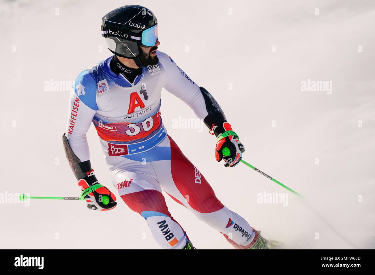 Switzerland's Daniele Sette gets to the finish area after completing ...