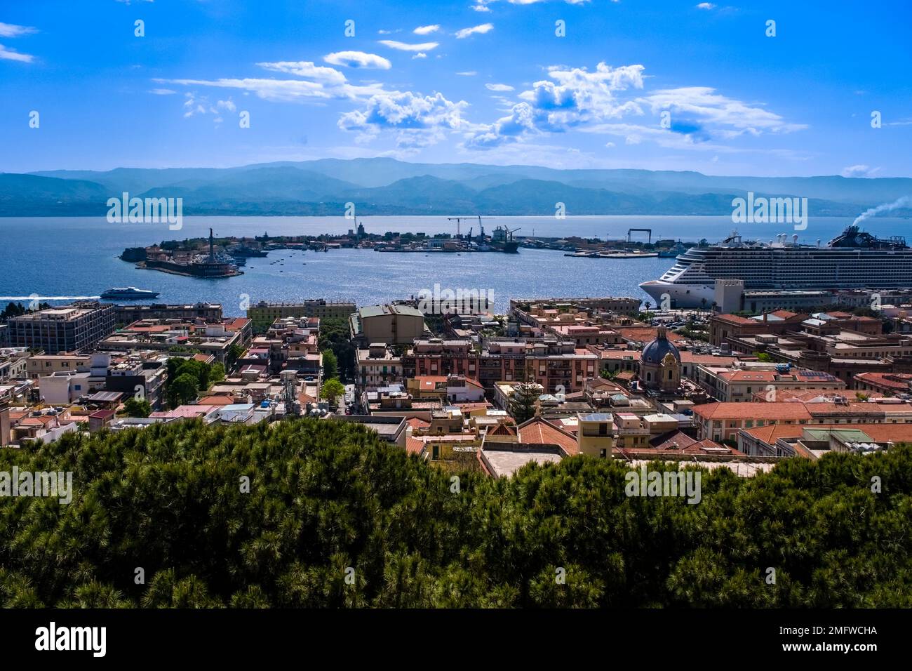Aerial view of Messina city and port with MSC Seaview cruise ship at ...