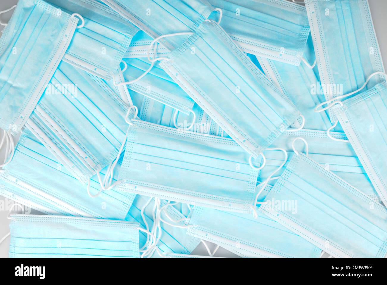 surgical masks blue wallpaper in top view on flat lay medical ...