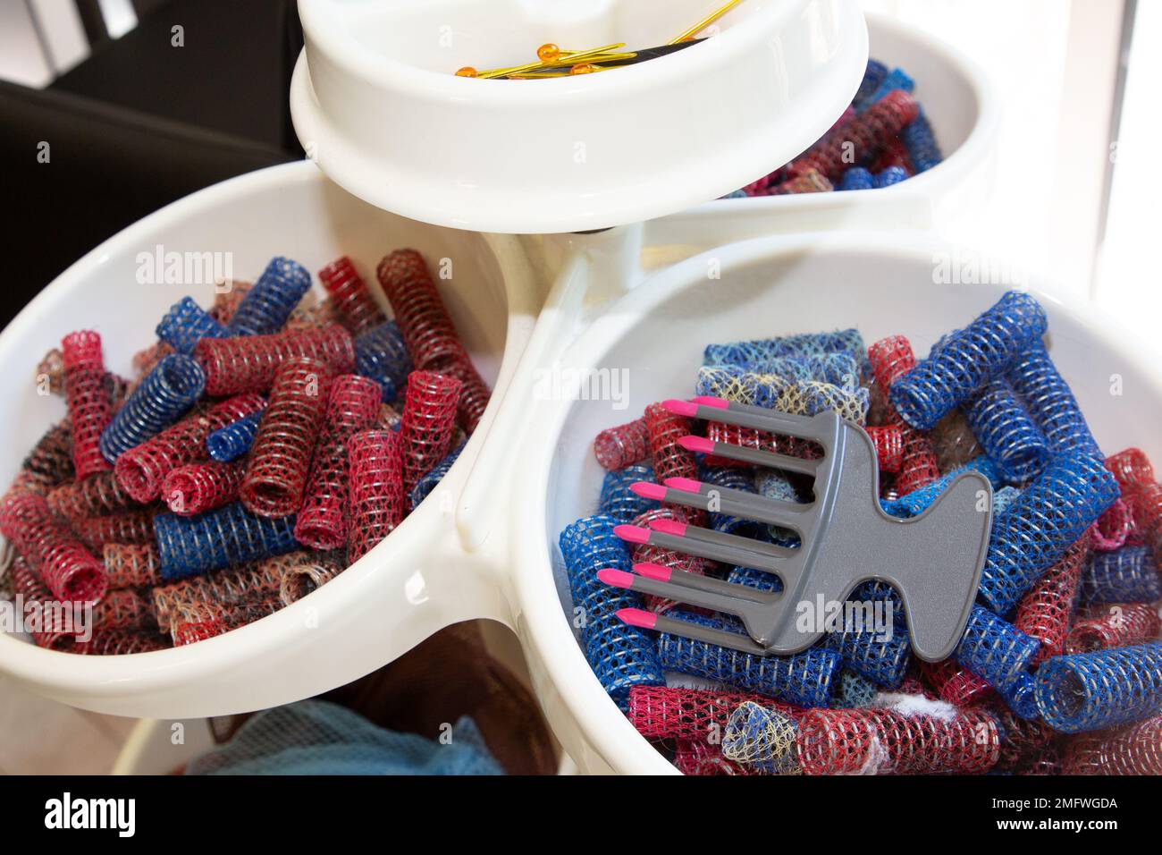 Lockenwickler lot curlers professional tools of hairdresser Stock Photo ...