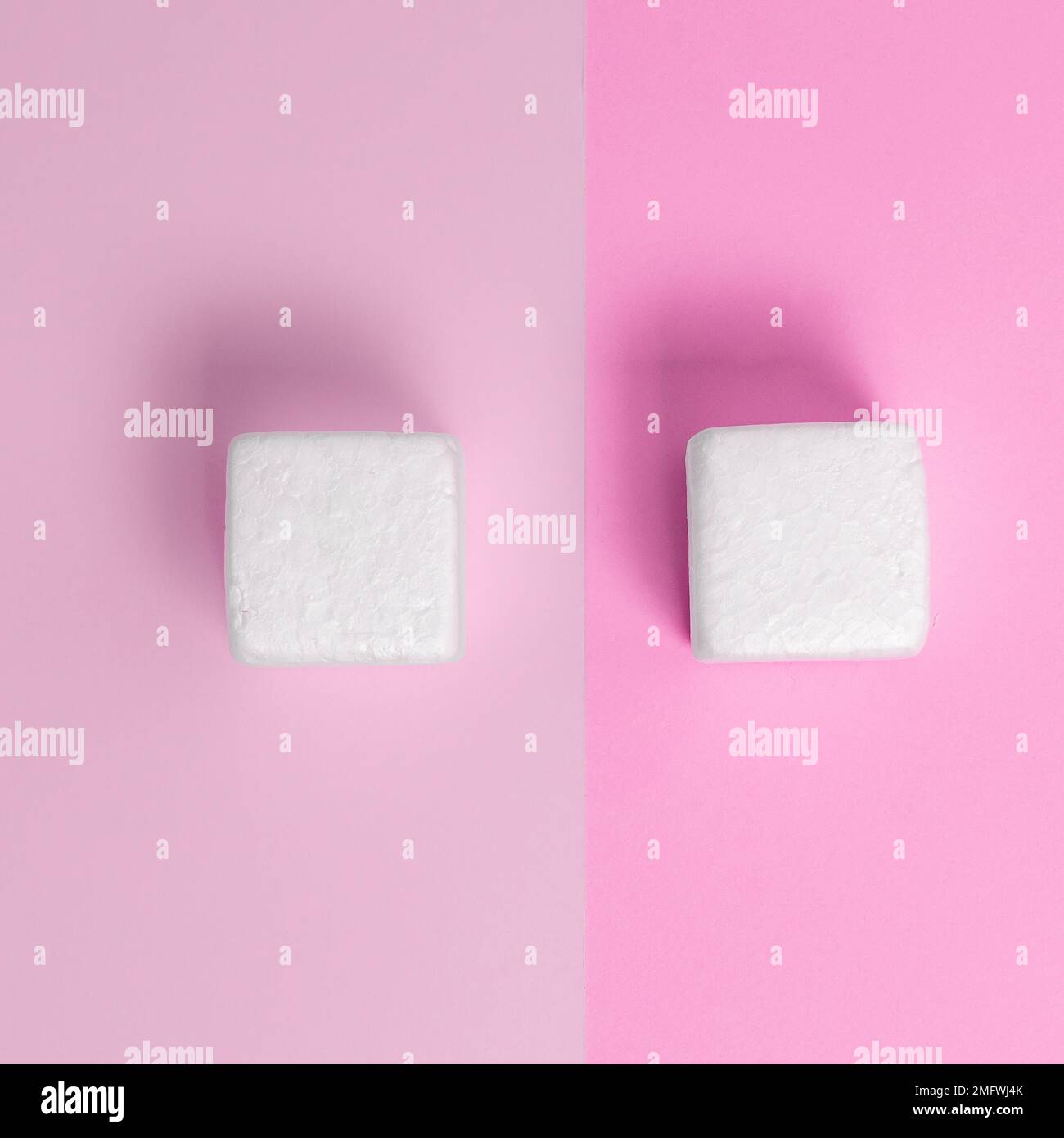 White Styrofoam Cubes Lying on Coloured Desk. Brand new Information ...