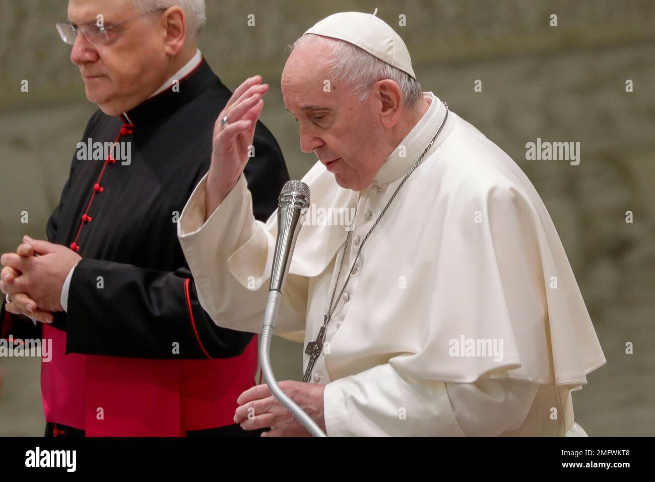 Pope Francis makes the sign of the cross at the start of his weekly ...