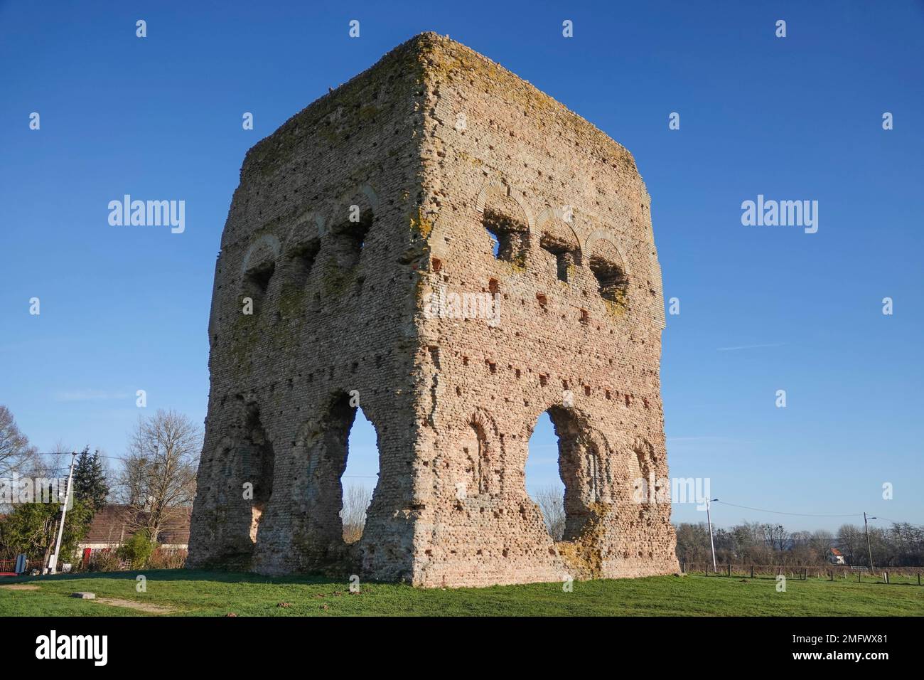 A scenic shot of the Temple of Janus under the blue sky in Autun ...