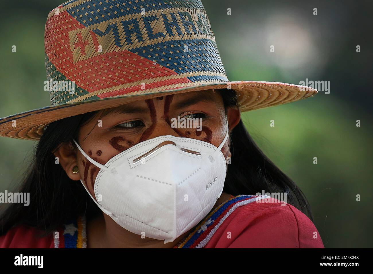 An Indigenous Wayuu woman wearing a mask against the spread of the new ...