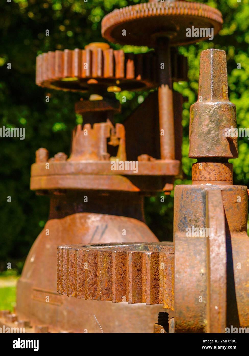 Heavy mining steel machinery closeup of drive cog wheel Stock Photo - Alamy