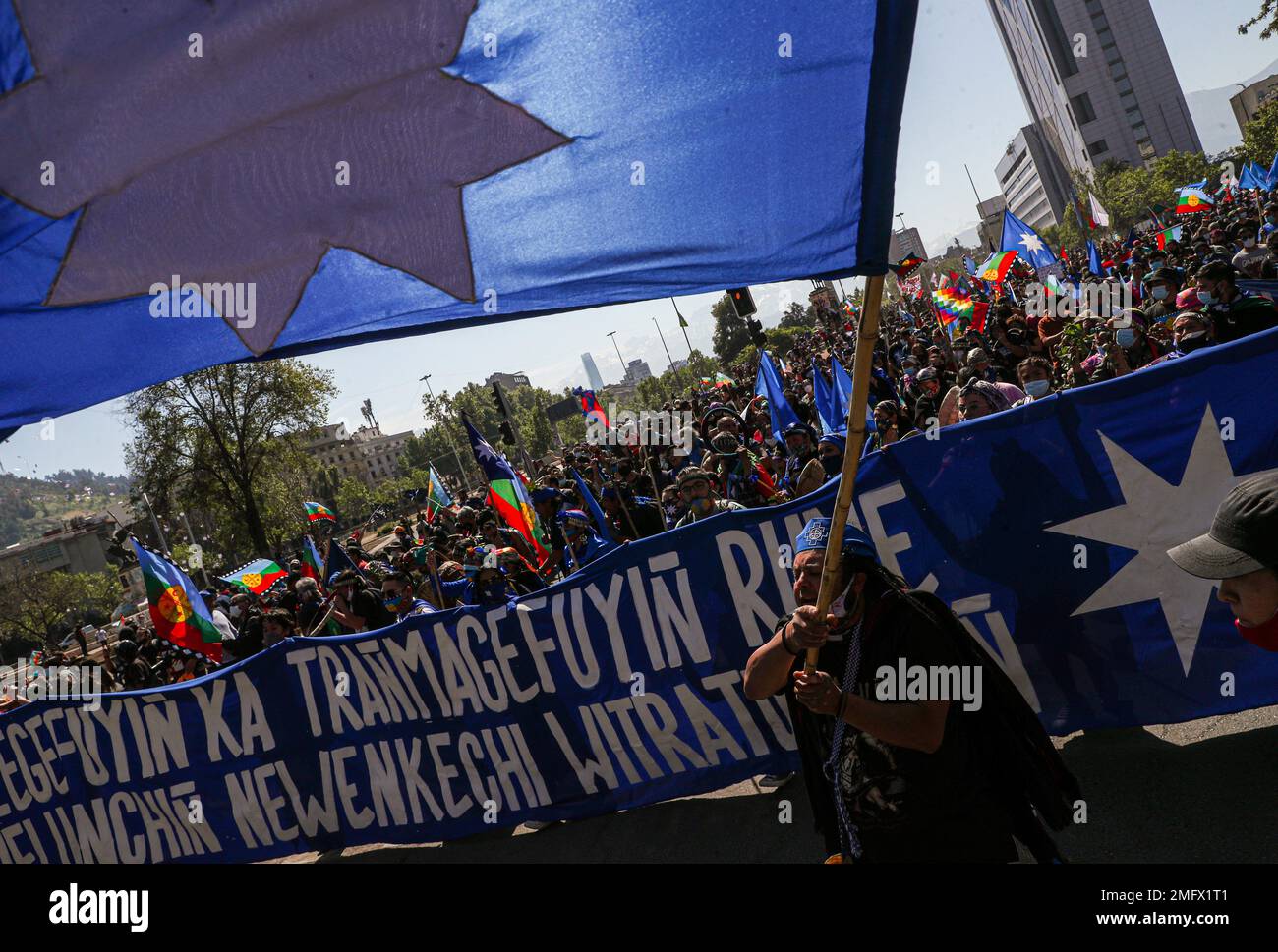 Mapuche Indigenous people march against the discovery of the Americas ...
