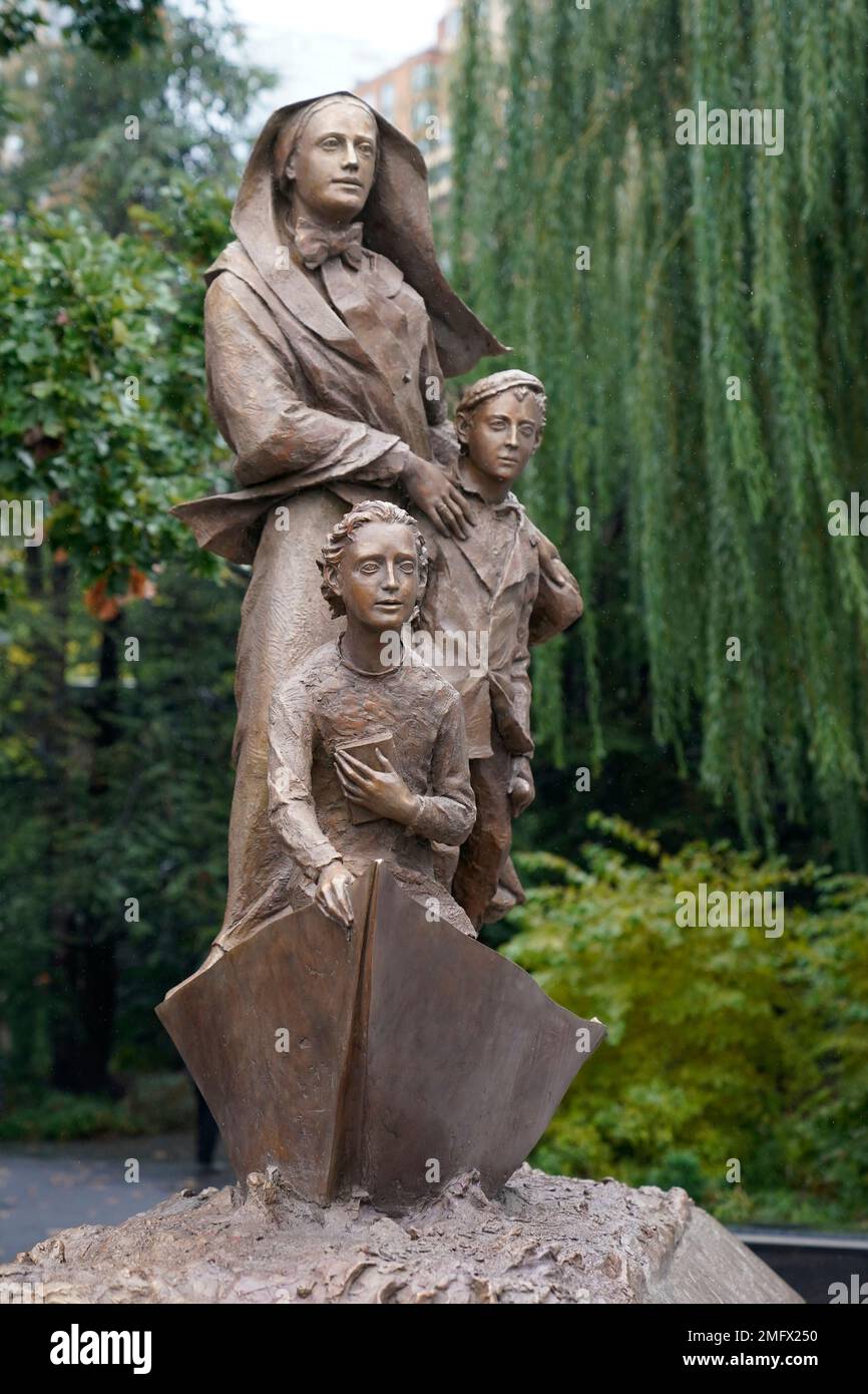 A statue of the patron saint of immigrants, Mother Frances Cabrini, is ...