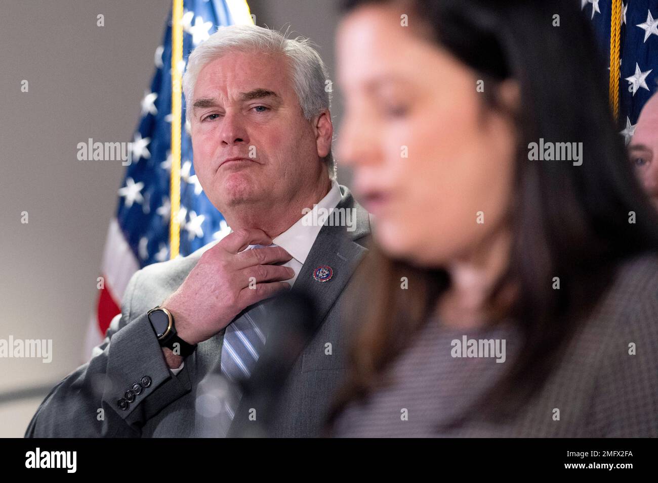 Majority Whip Rep. Tom Emmer, R-Minn., left, adjusts his tie as ...