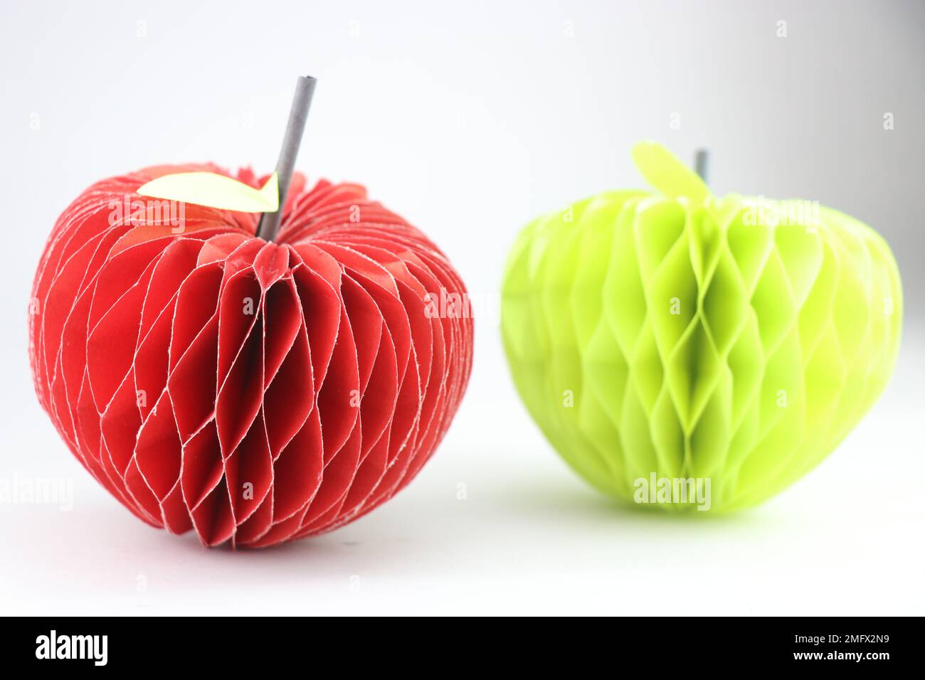 Origami apple or paper apple of red and green color with 3d effect ...