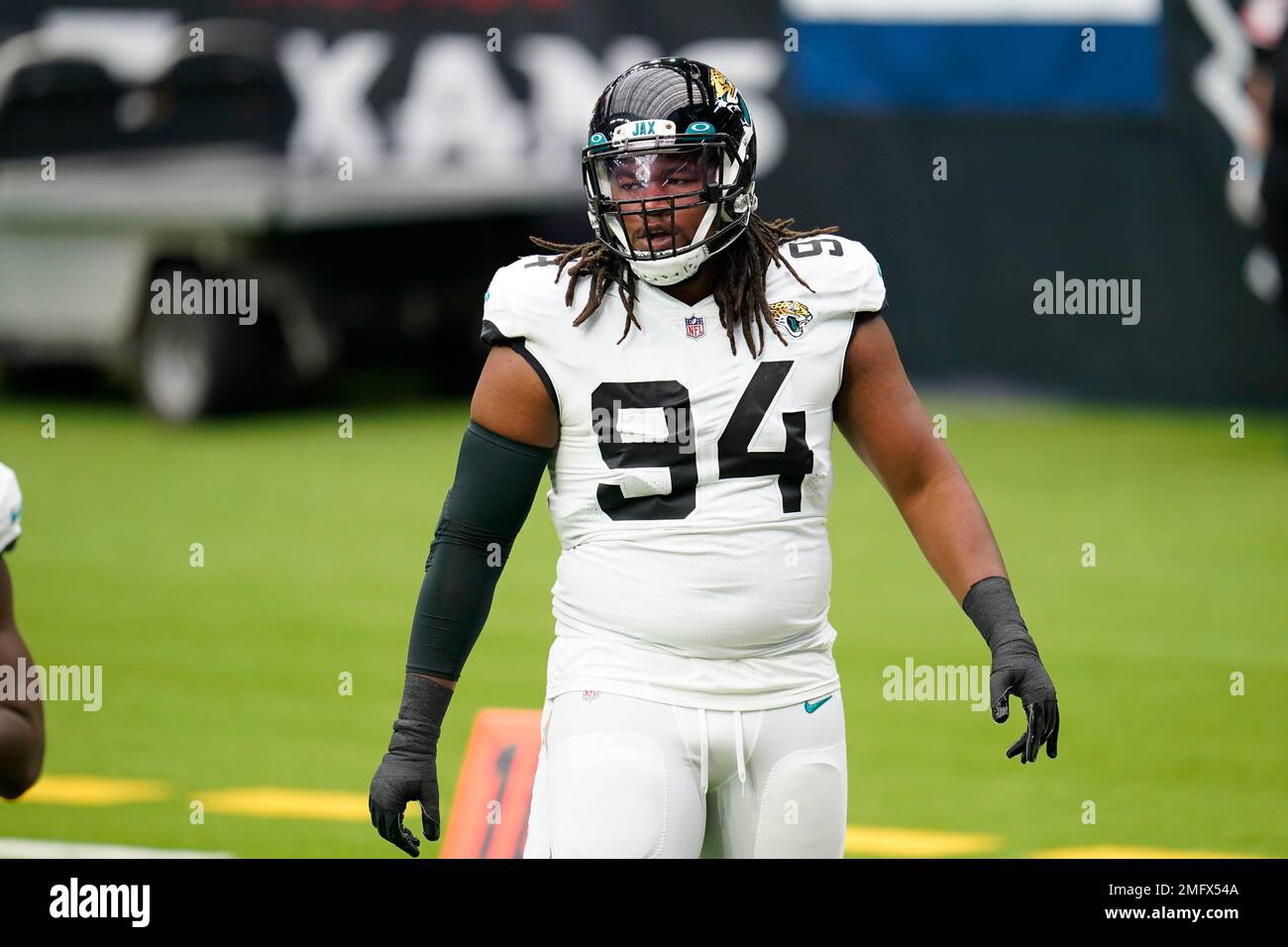 Jacksonville Jaguars defensive lineman Dawuane Smoot (94) looks on ...