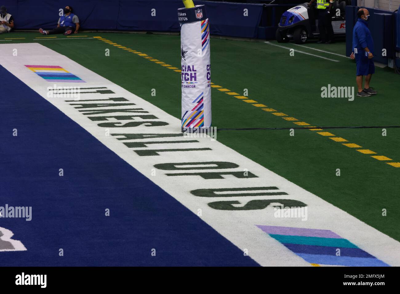 The Crucial Catch logo is displayed on the end zone line and goal post ...