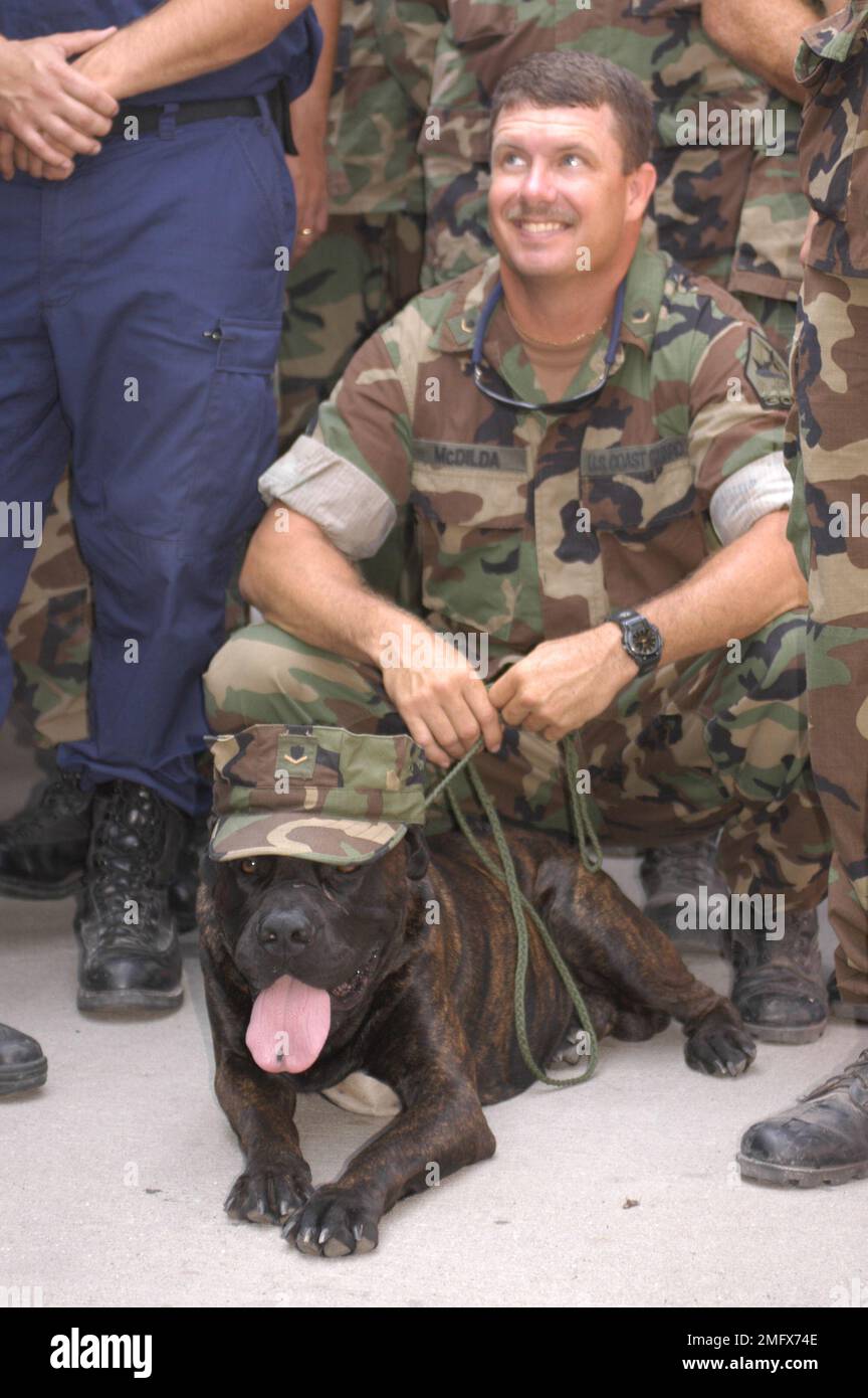 Vice Admiral Vivien Crea - 26-HK-15-56. Coast Guard personnel with dog ...