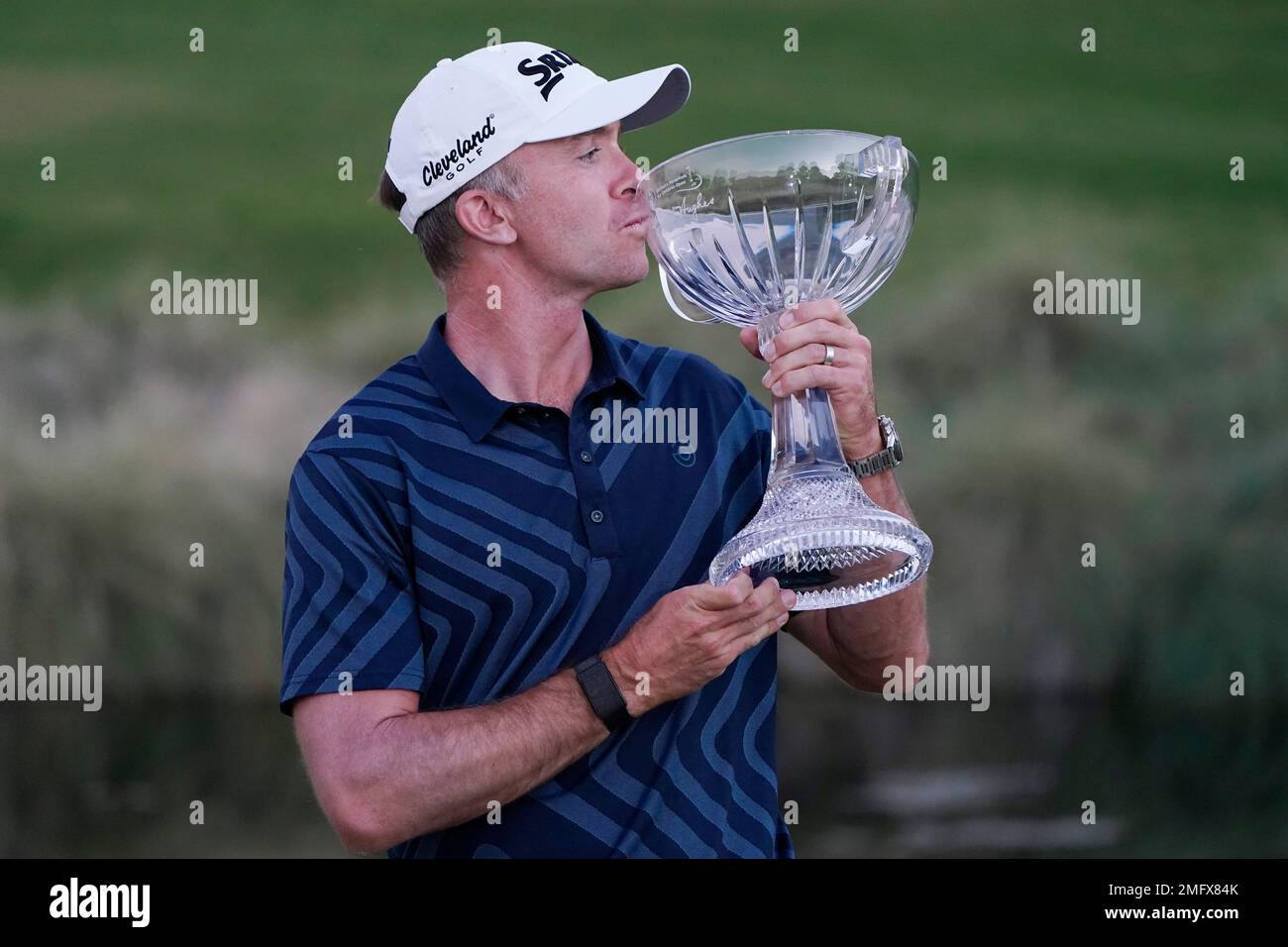 Martin Laird poses with the trophy after winning the Shriners Hospitals ...