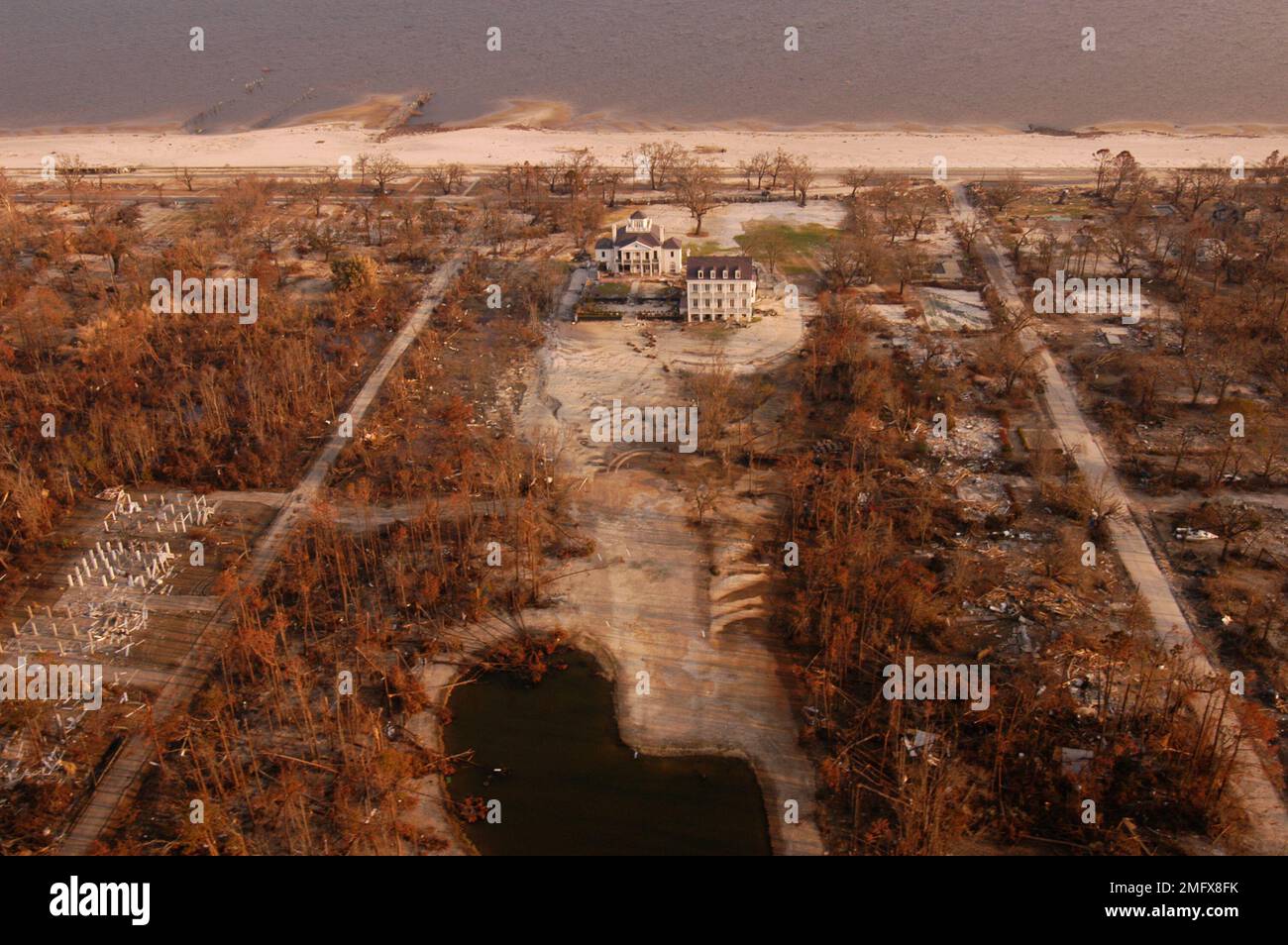 Vice Admiral Vivien Crea - 26-HK-15-22. aerial view of destroyed houses ...