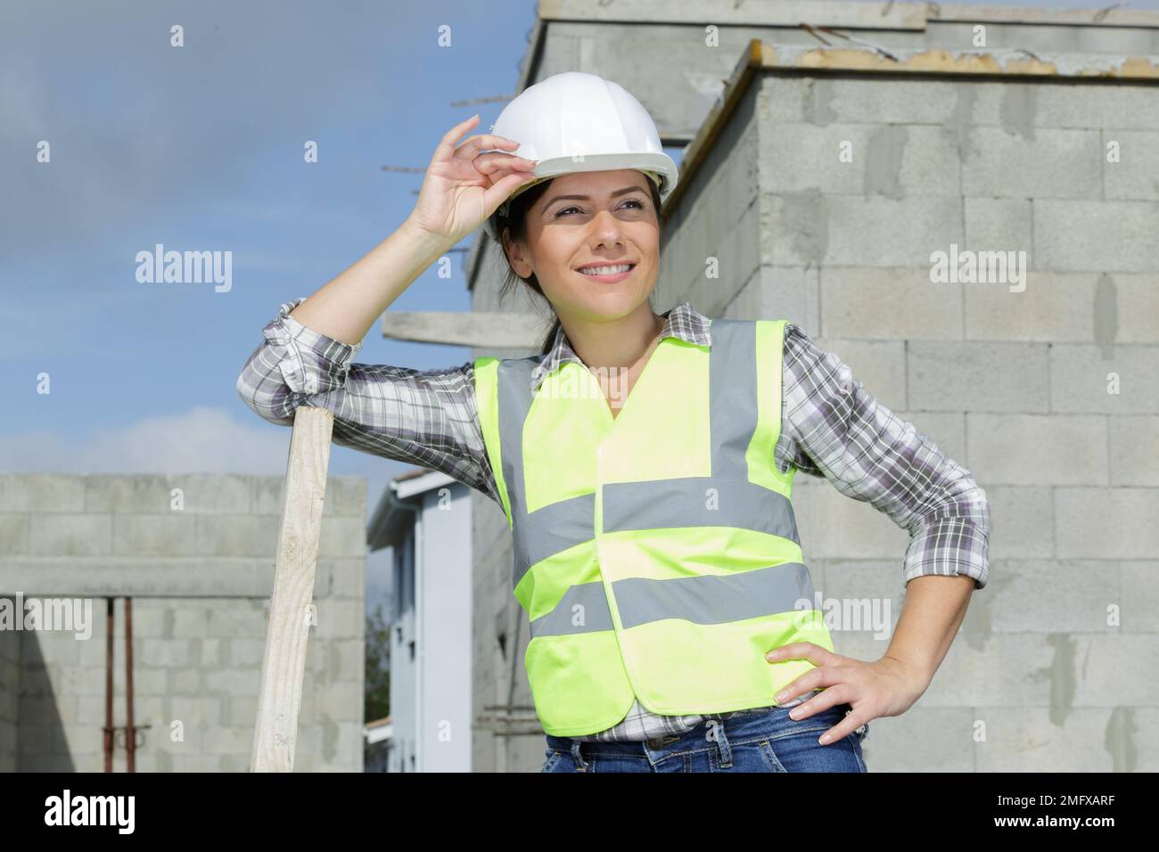portrait of female construction worker on building site Stock Photo - Alamy