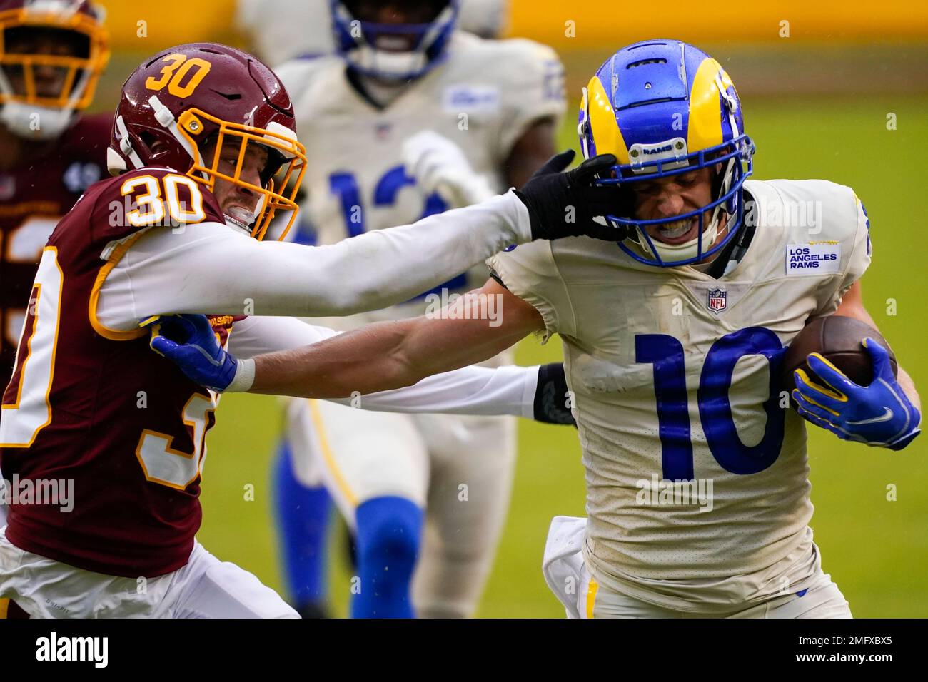 Los Angeles Rams' Cooper Kupp tries to get past Washington Football ...
