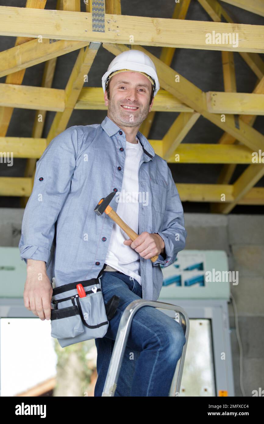 construction worker with a hammer Stock Photo - Alamy