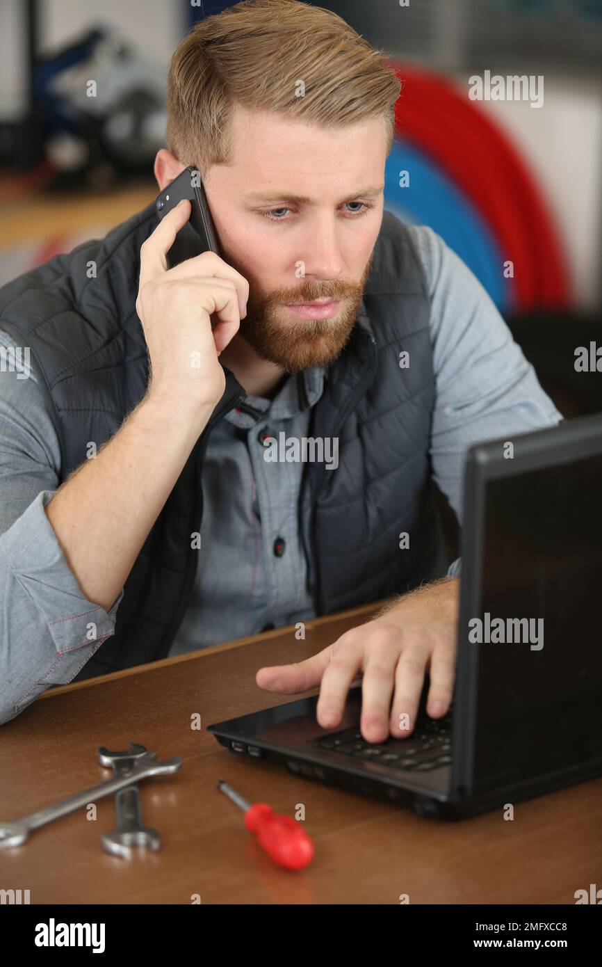 male worker having an important phone call Stock Photo - Alamy
