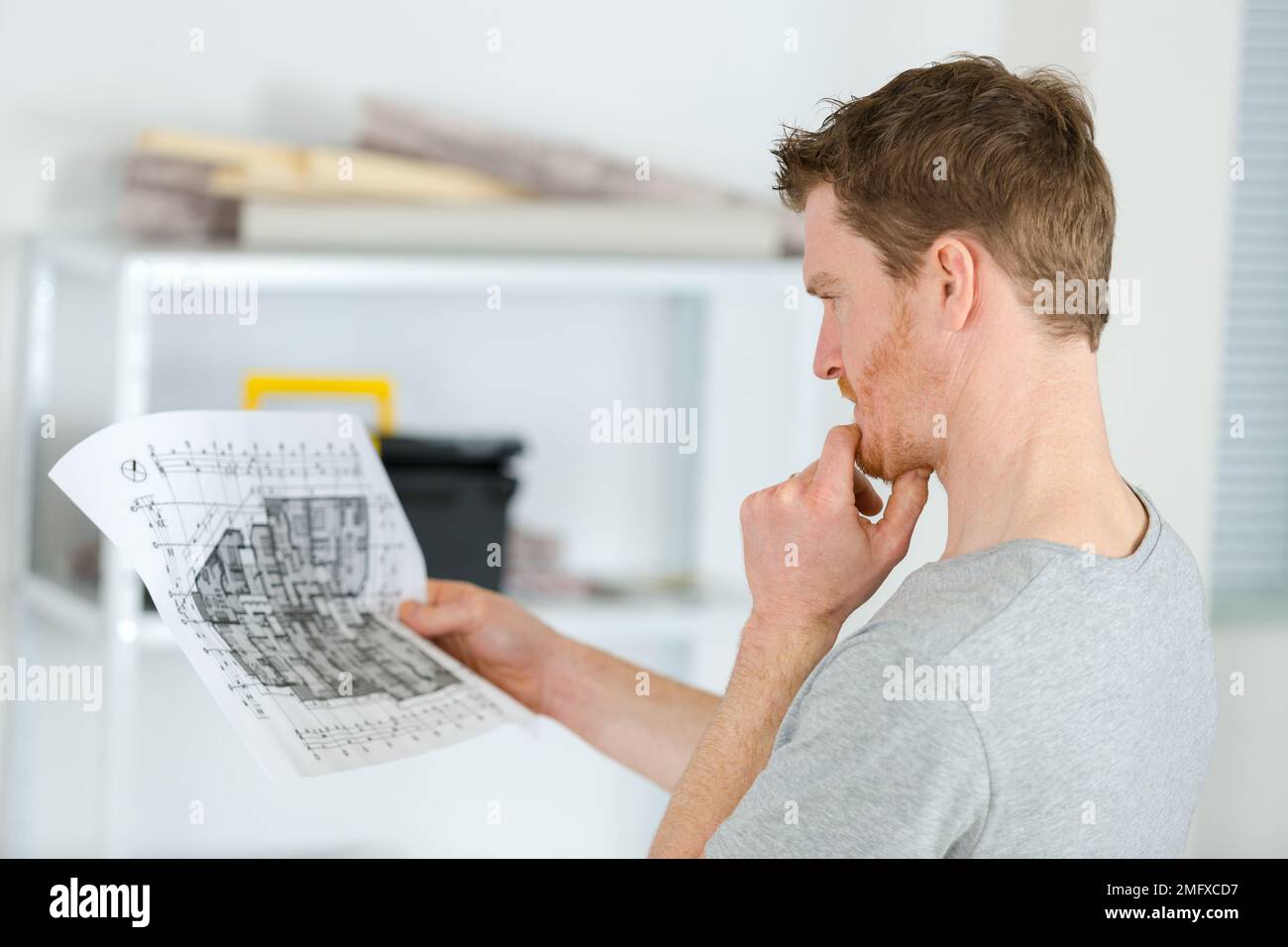 Portrait foreman looking documents hi-res stock photography and images ...