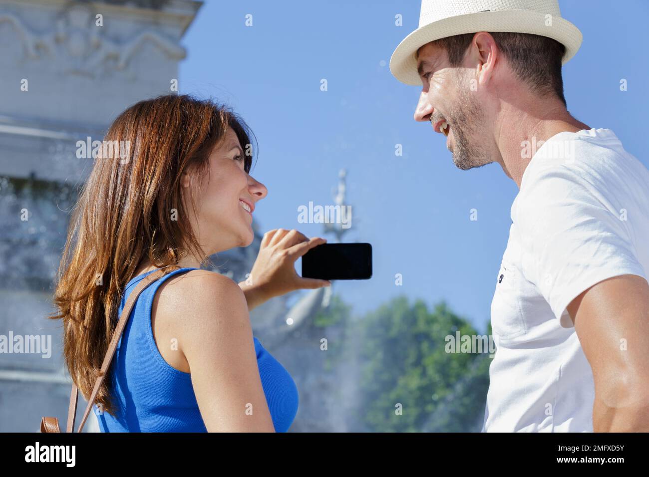 woman smiling for holiday picture Stock Photo - Alamy