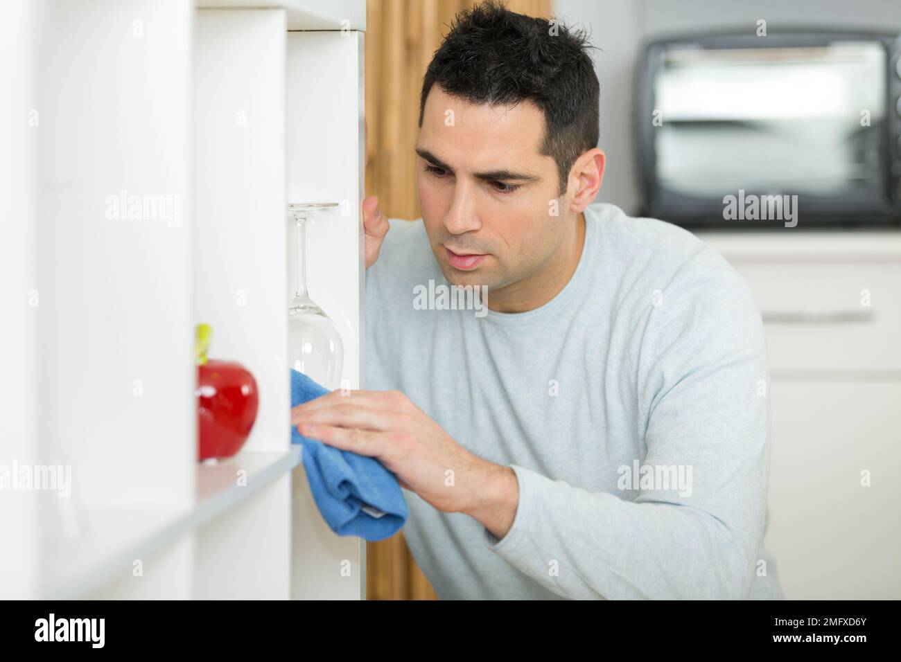 Man feather duster hi-res stock photography and images - Alamy