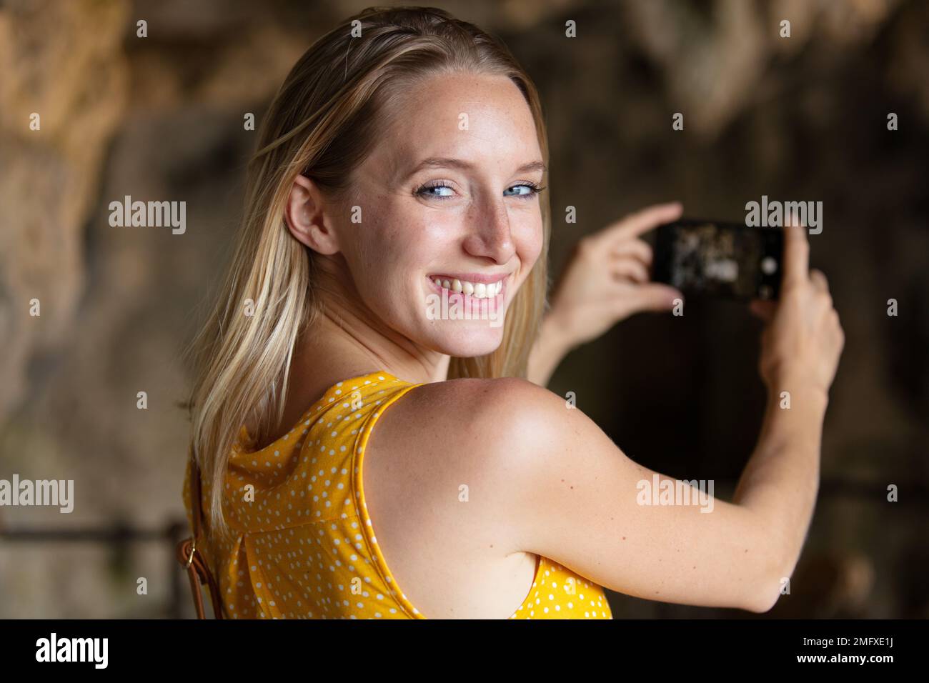 female woman taking a selfie in a cave Stock Photo - Alamy