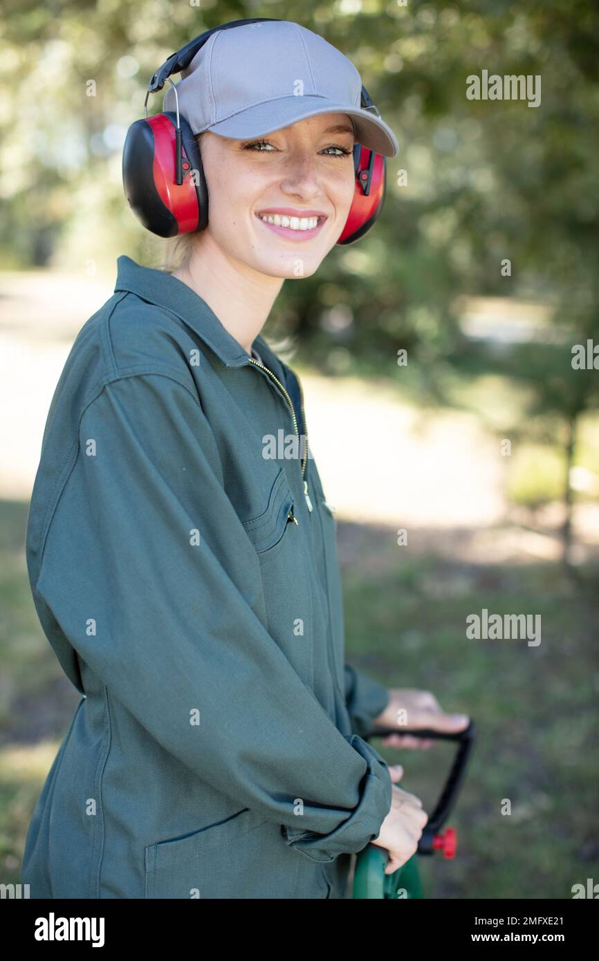 young attractive landscaper woman working in a public park Stock Photo ...